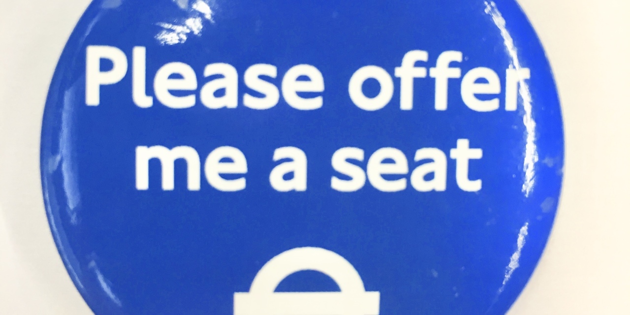 How It Feels to Wear My Disability Blue Badge on the Train